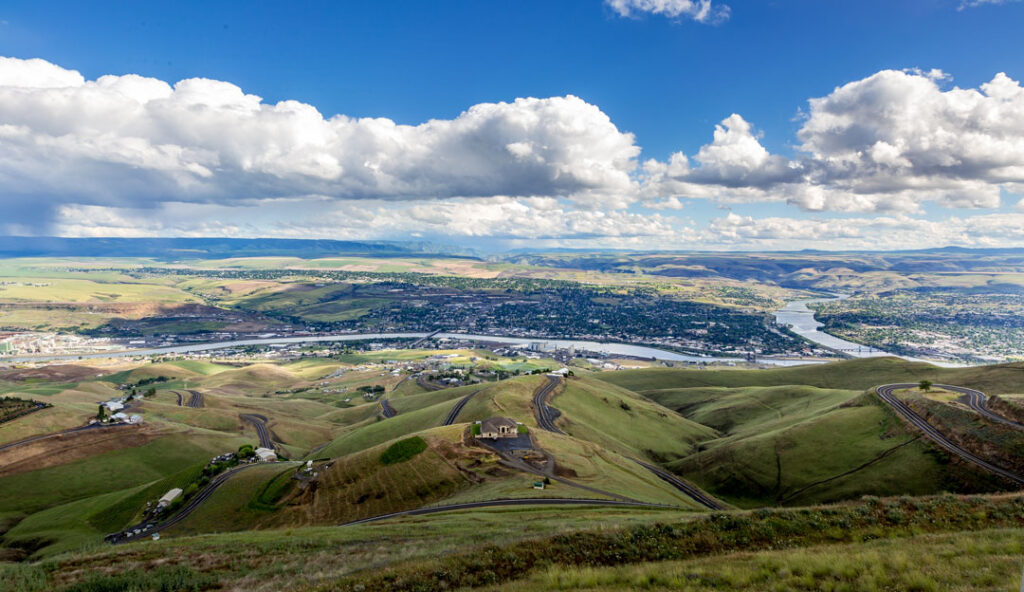 A hilltop view of the winding two-lane highway, Lewiston Hill, and ...